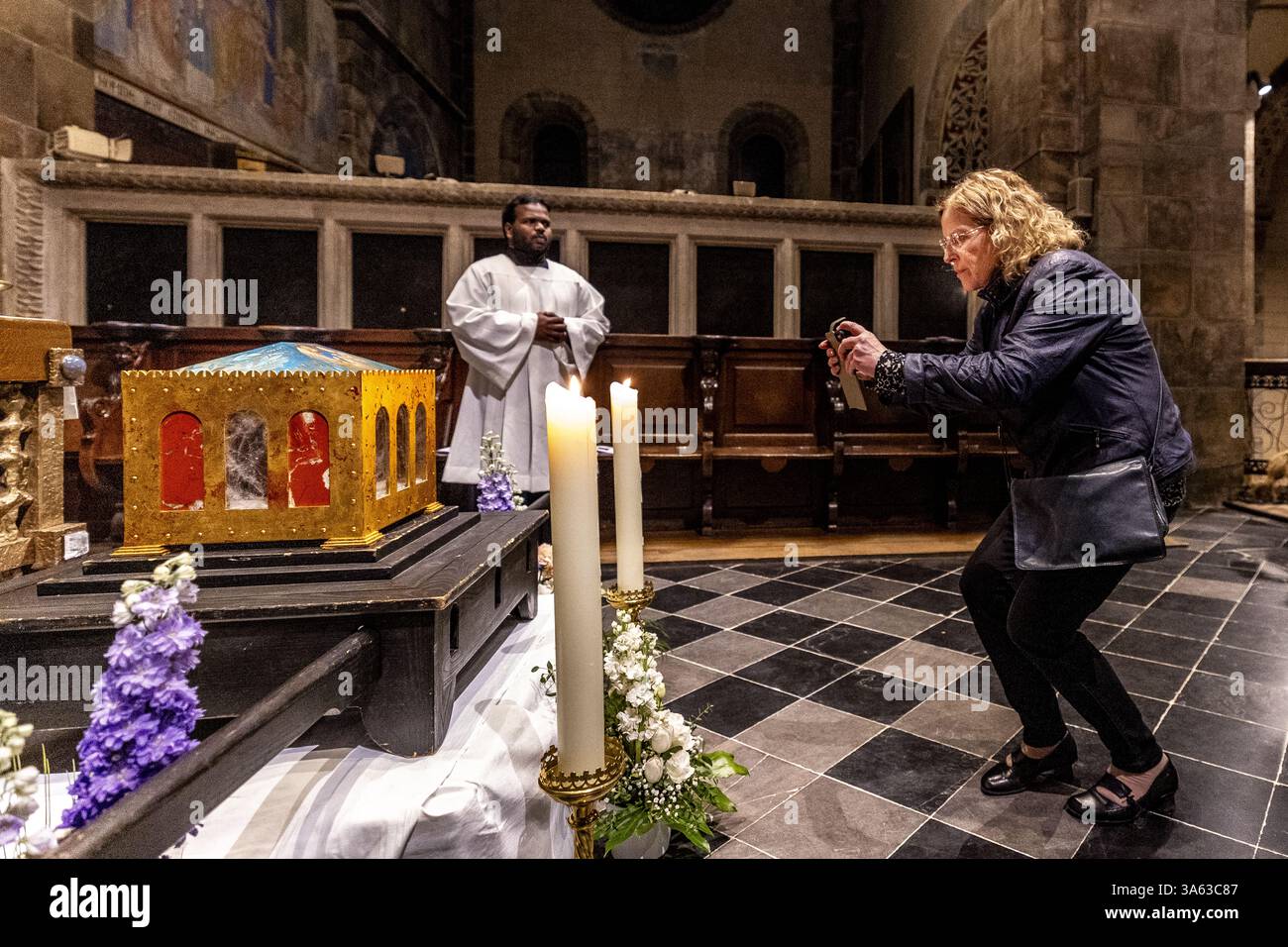 KERKRADE - Believers during a prayer vigil around the relics of St ...