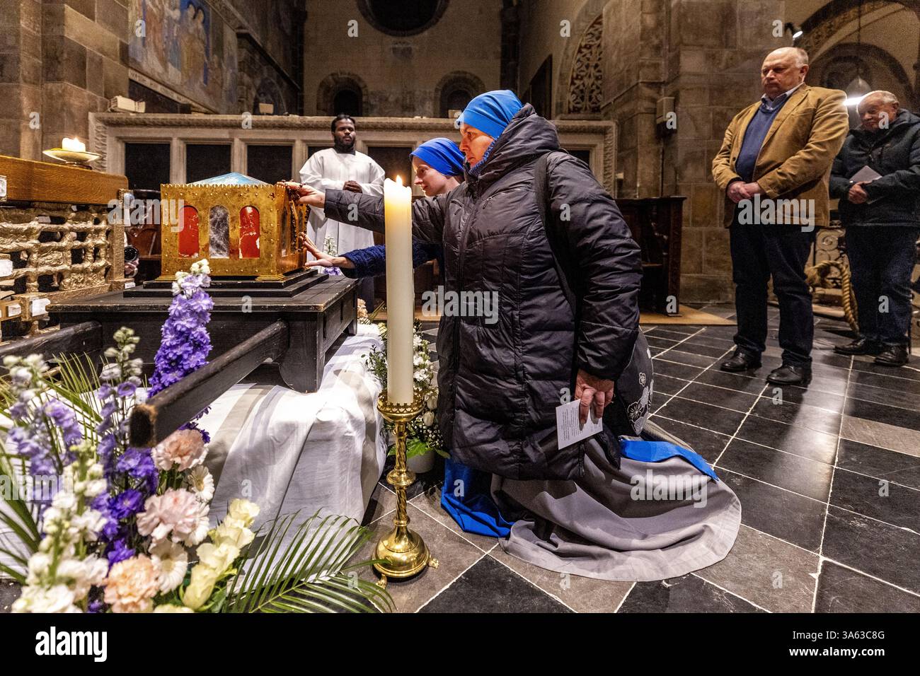 KERKRADE - Sisters during a prayer vigil around the relics of St ...