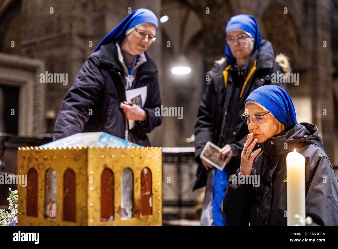 KERKRADE - Sisters during a prayer vigil around the relics of St ...