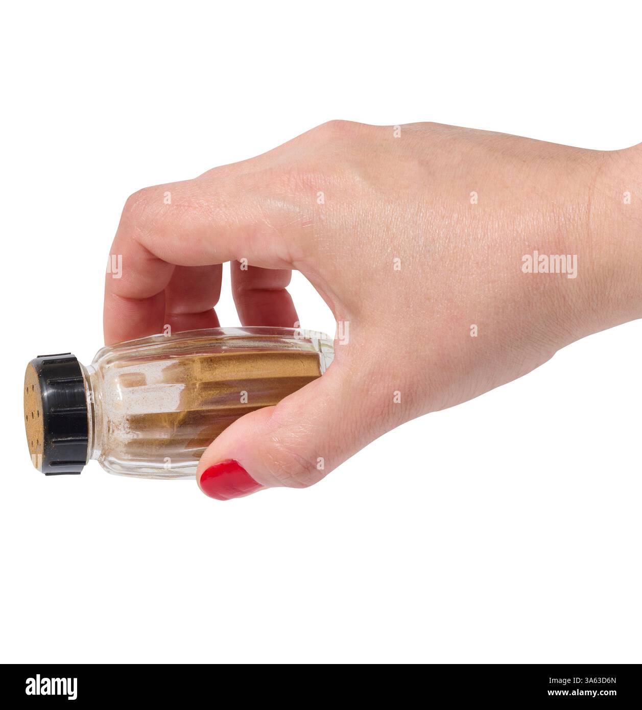 Female hand holding container with ground cinnamon on isolated ...