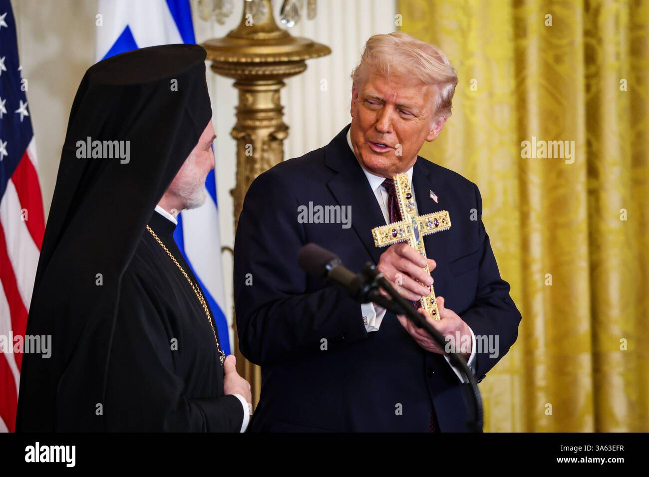 Washington, United States. 24th Mar, 2025. President Donald Trump holds ...