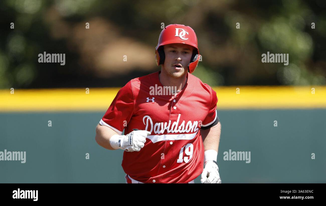 Davidson baserunner Chris Schuchart rounds the bases after hitting a ...