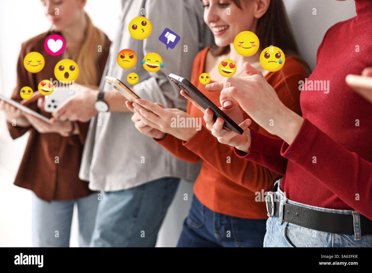 Social media. Group of young people using different gadgets, closeup ...