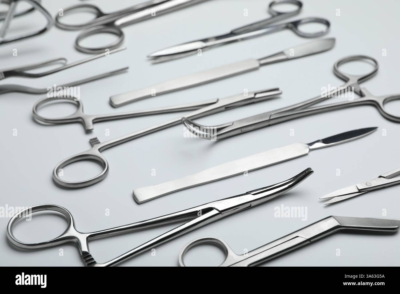 Different surgical tools on light gray background, closeup Stock Photo ...