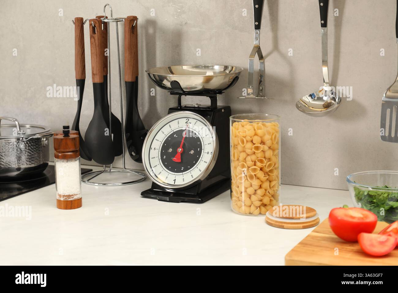 Retro mechanical kitchen scale, other utensils and different food ...