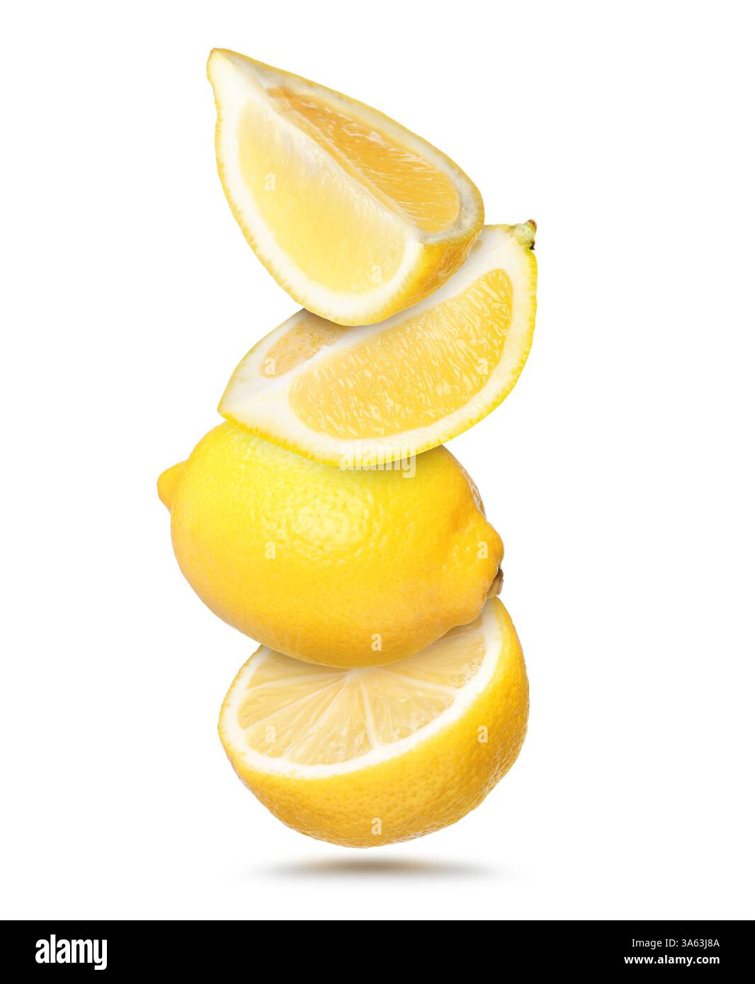 Cut and whole fresh lemons falling on white background Stock Photo - Alamy