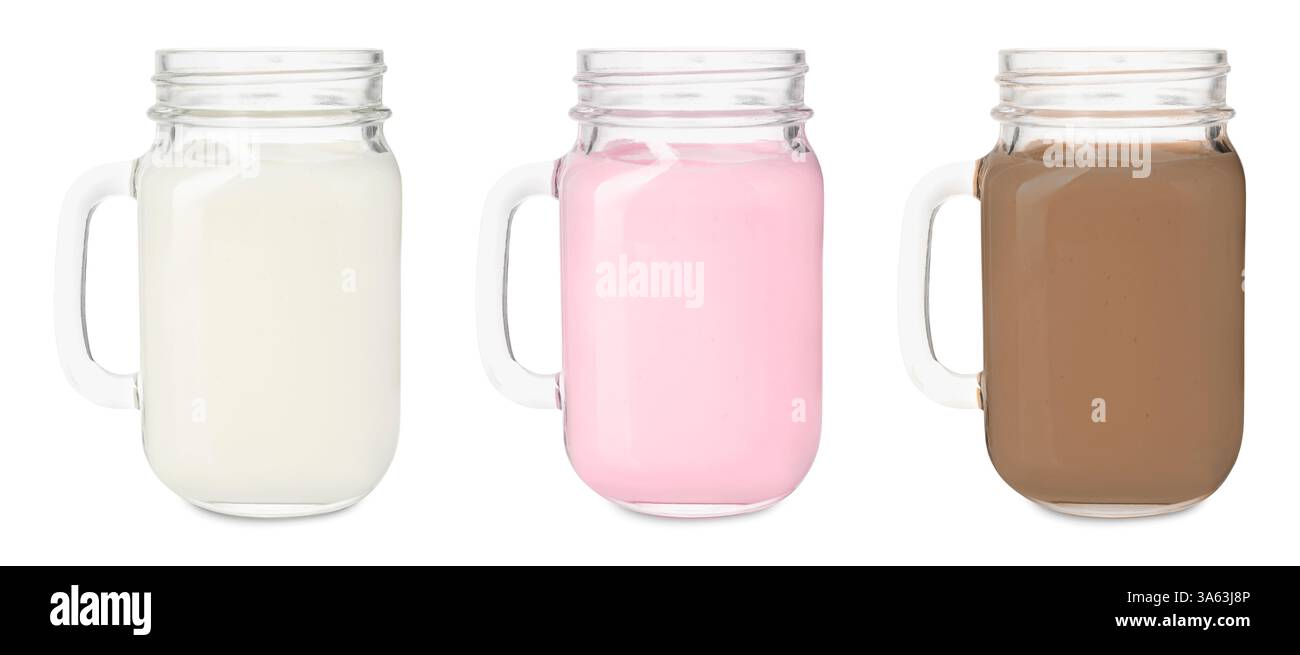 Milk of different flavors in mason jars isolated on white. Vanilla ...