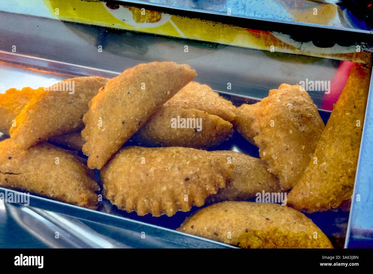 Deep-fried empanadas for sale at a stand on the street in Cali ...