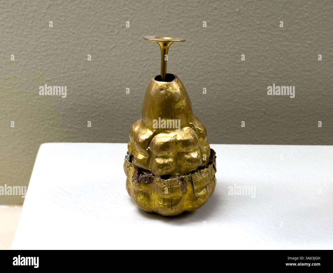 Gold artifact from the pre-Hispanic indigenous Calima Culture in the ...