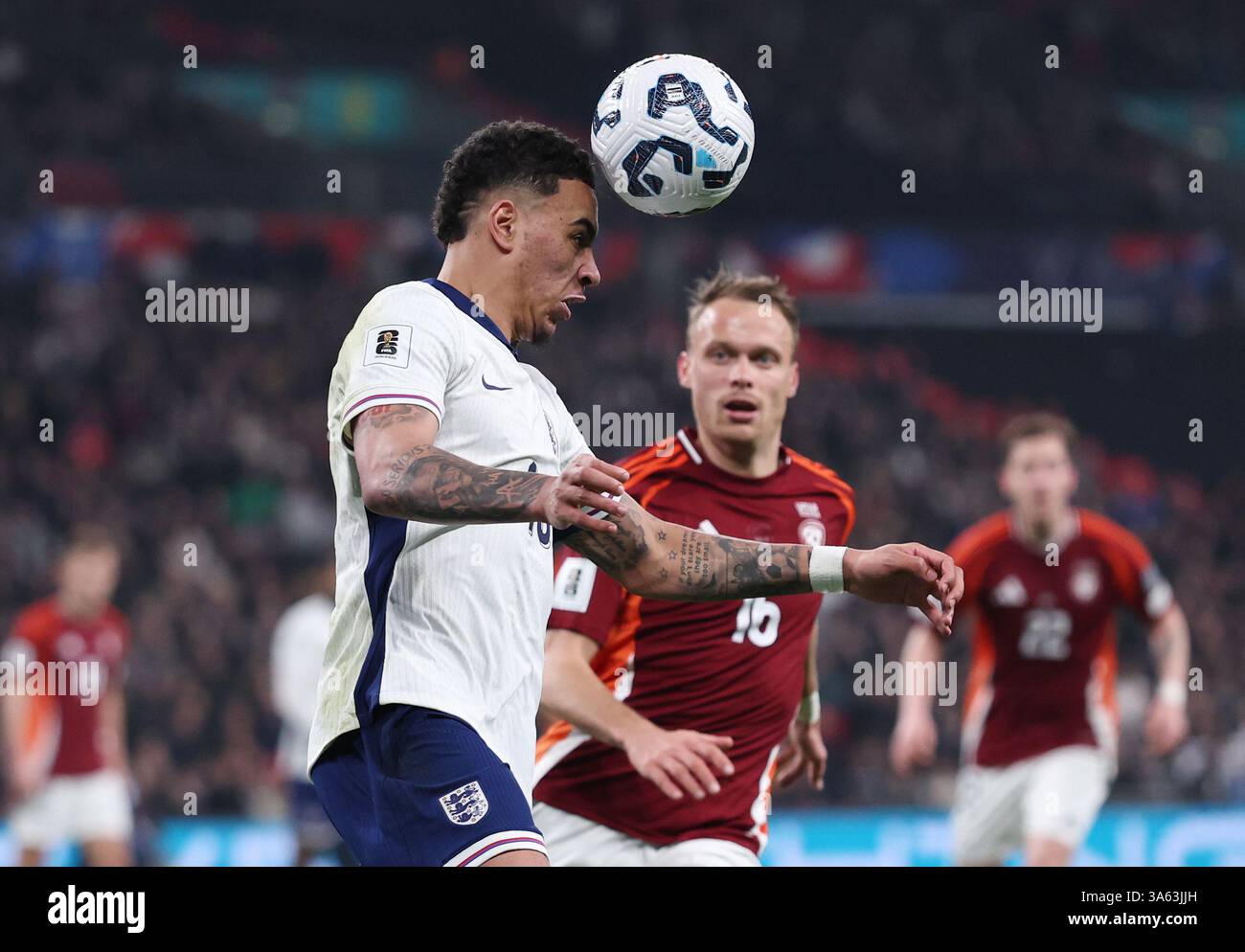 London, UK. 24th Mar, 2025. Morgan Rogers of England and Alvis Jaunzems ...