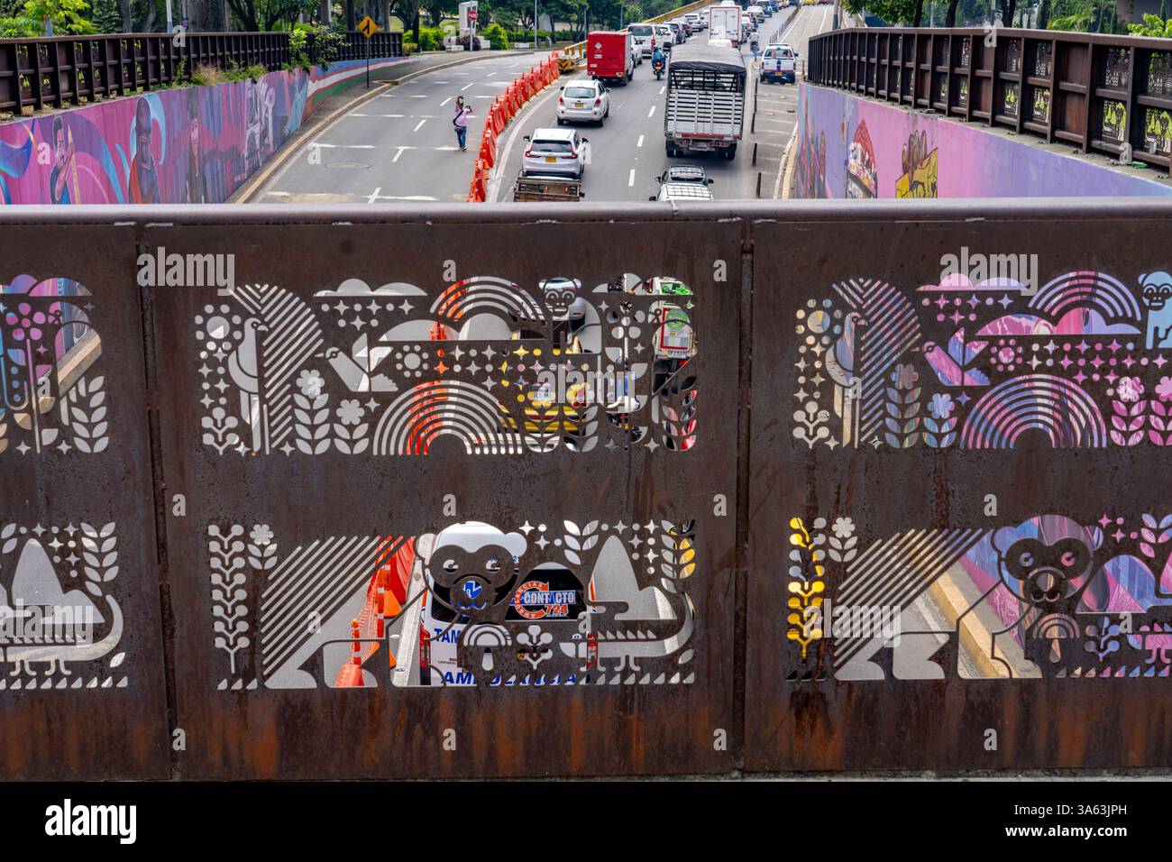 Metal sculpture of nature scenes on the bridge railings above the ...