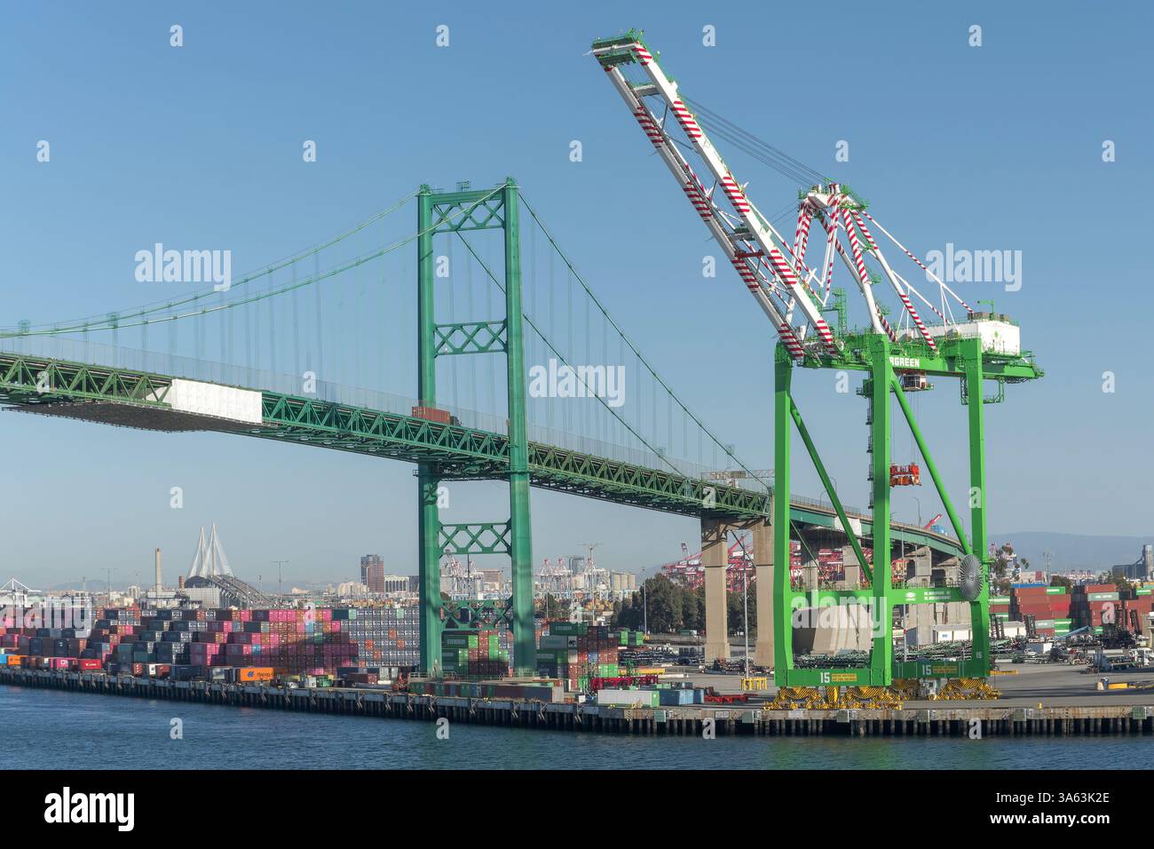view of industrial cranes and Vincent Thomas bridge, Los Angeles port, Los Angeles, California ...