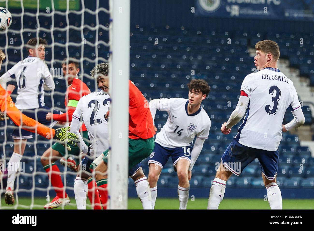 #3, Joao Muniz of Portugal U21s attempts to gets his head to the ball ...