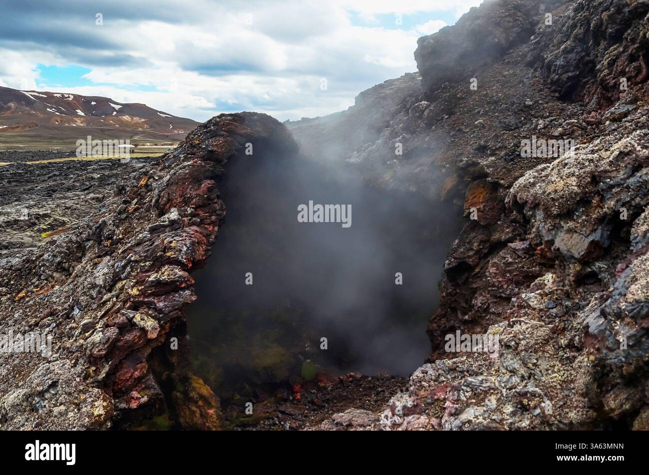 Smoke billowing from a volcanic vent in the Icelandic highlands ...