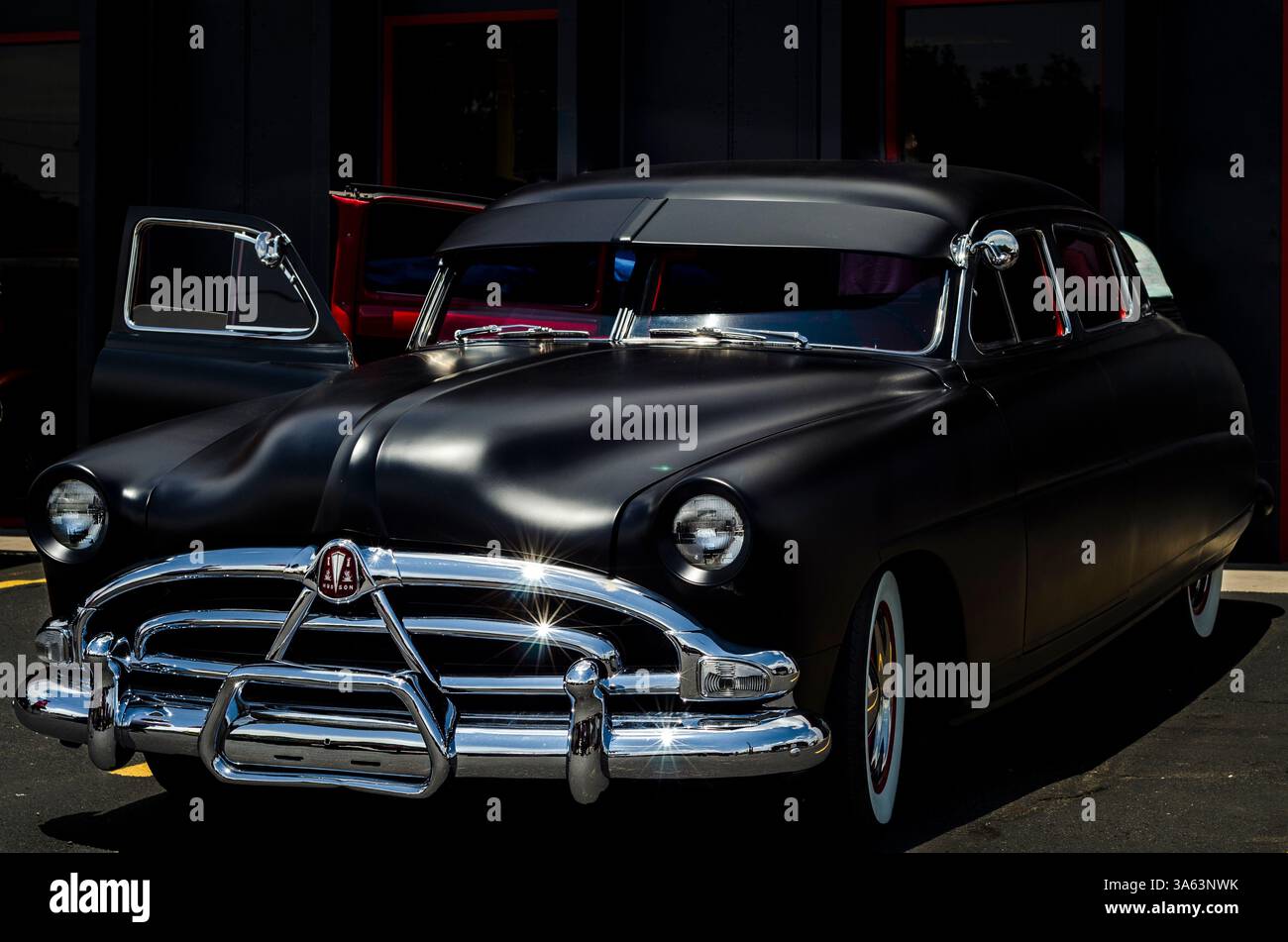 Vintage Black Classic Car with Chrome Detailing in an Urban Street ...