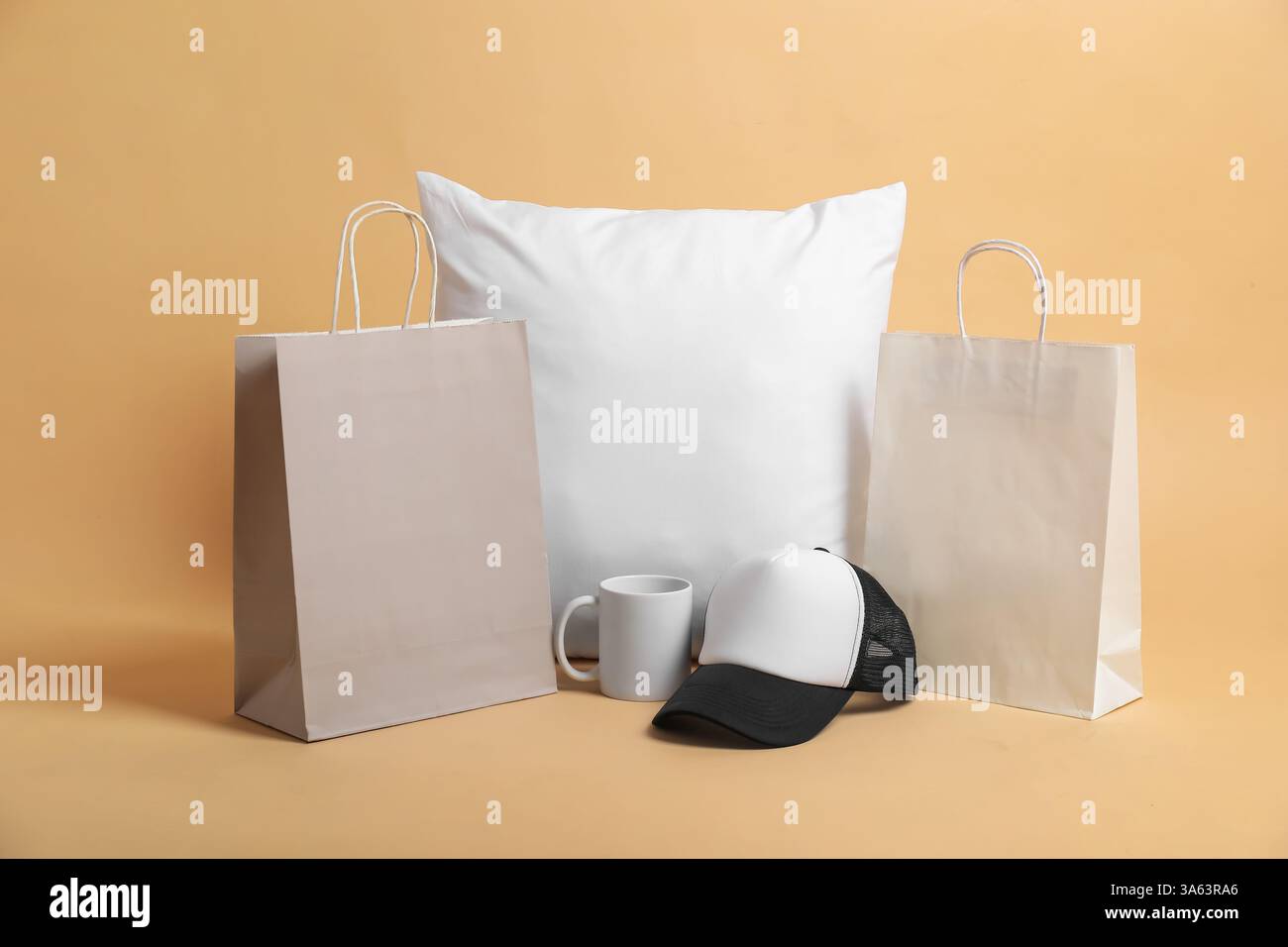 Different blank items for branding on beige background. Mockup for ...