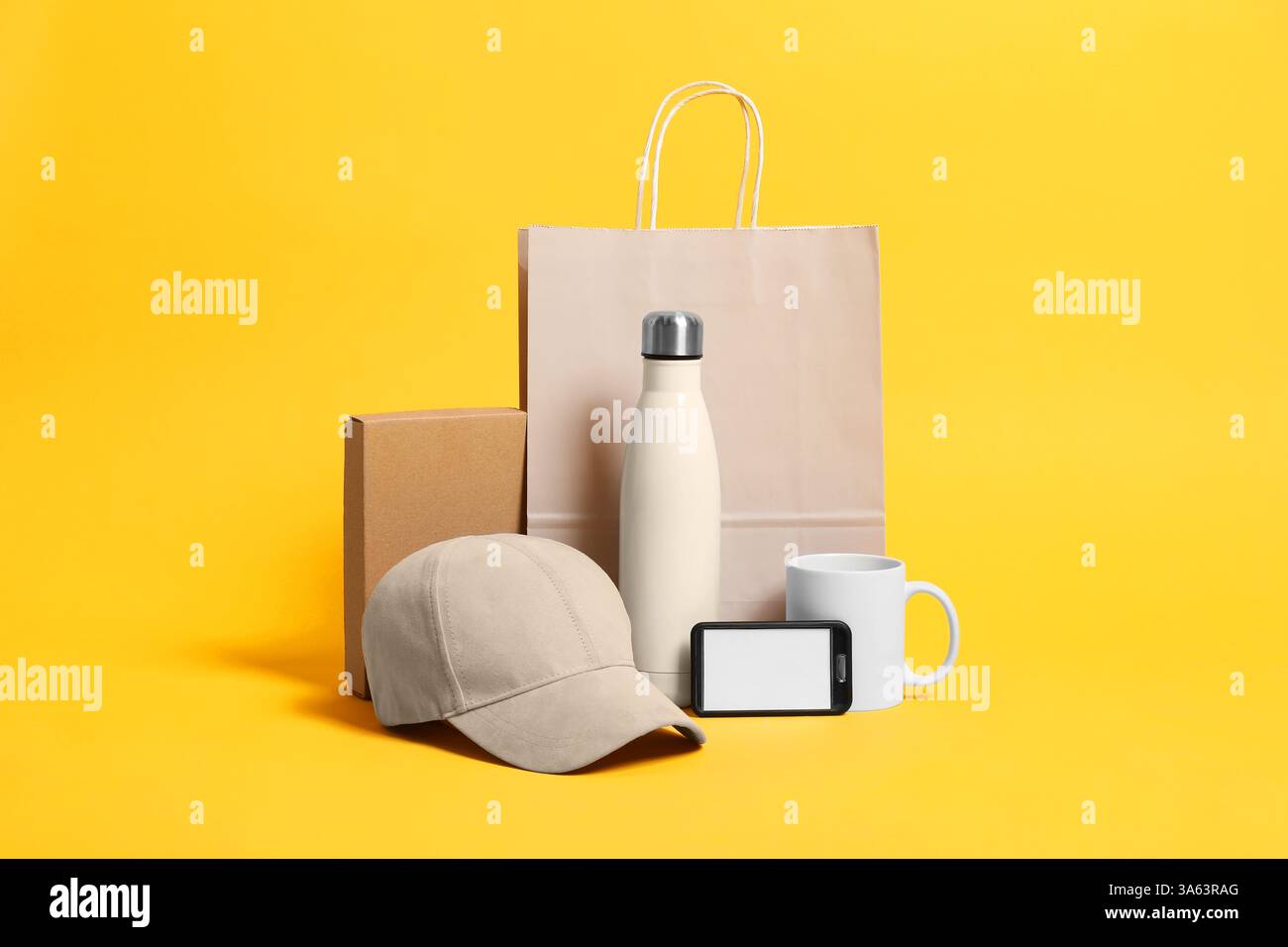 Different blank items for branding on orange background. Mockup for ...