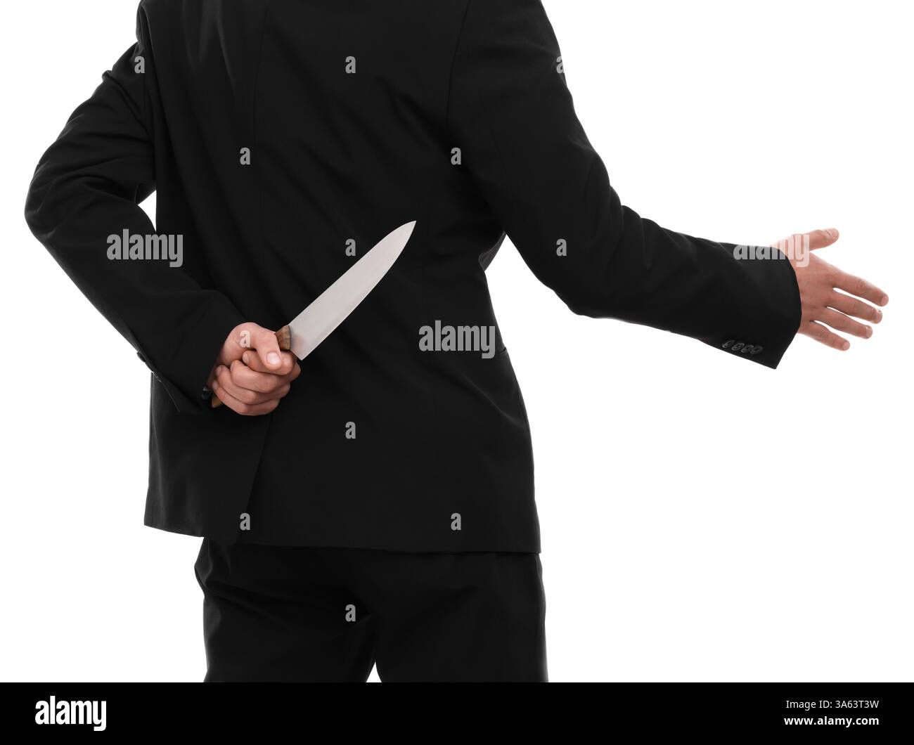 Businessman holding knife behind his back and offering handshake on ...