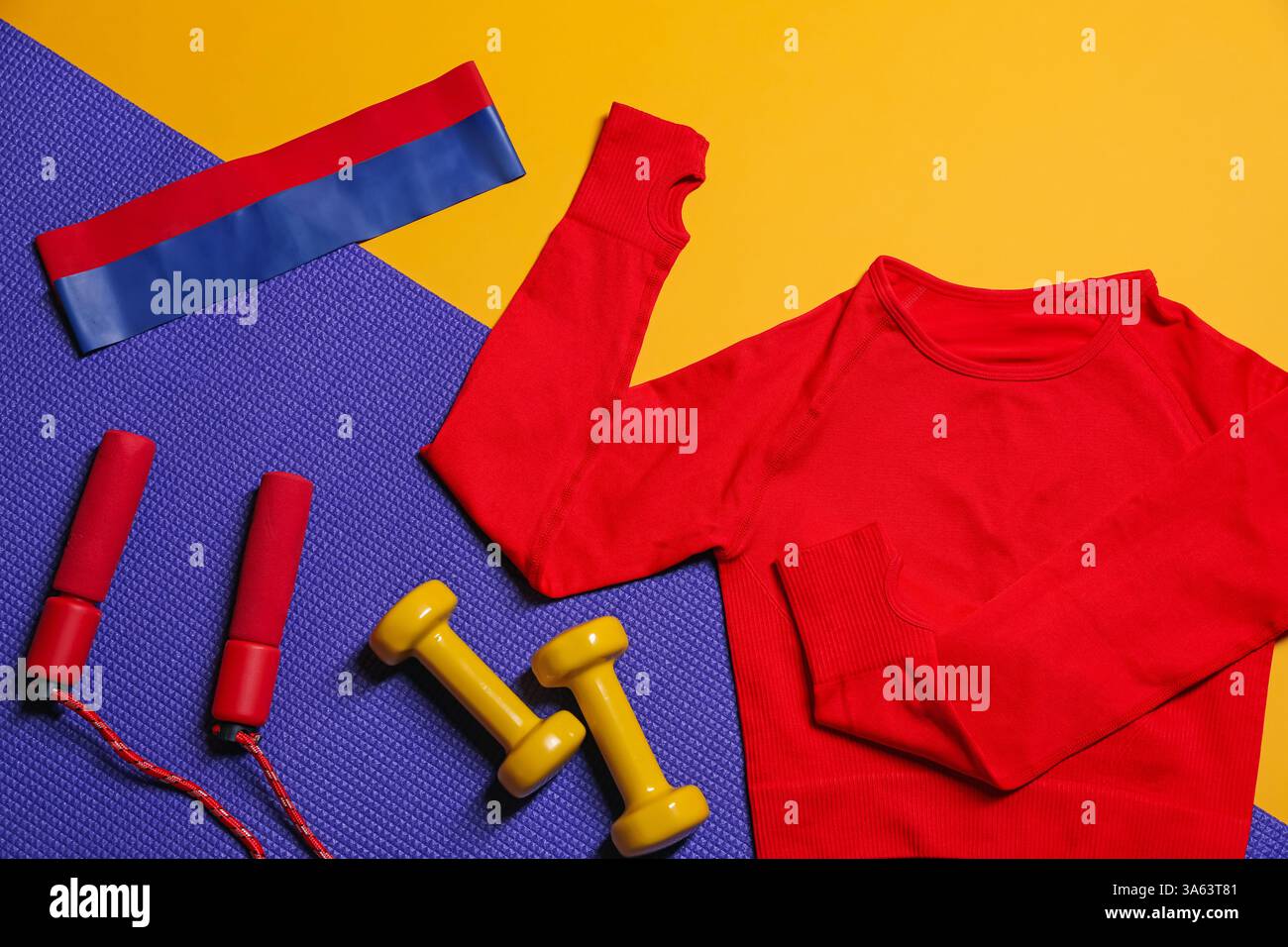 Different gym stuff on yellow background, flat lay Stock Photo - Alamy