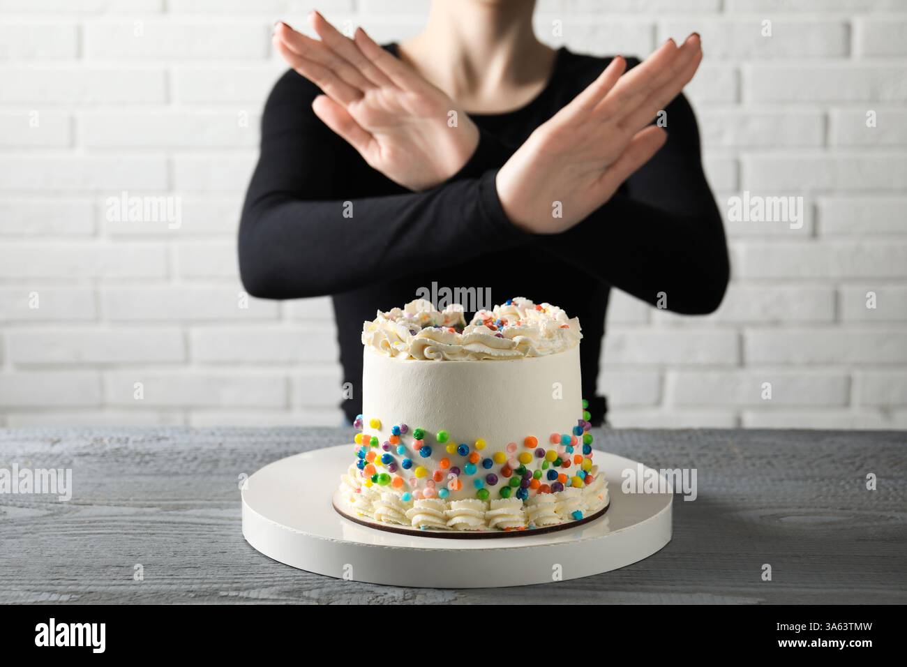 Woman refusing eat cake hi-res stock photography and images - Alamy