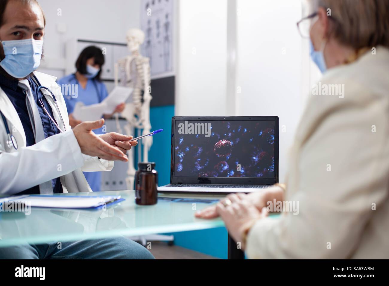 Doctor consults with old woman in clinic showing enlarged flu virus ...