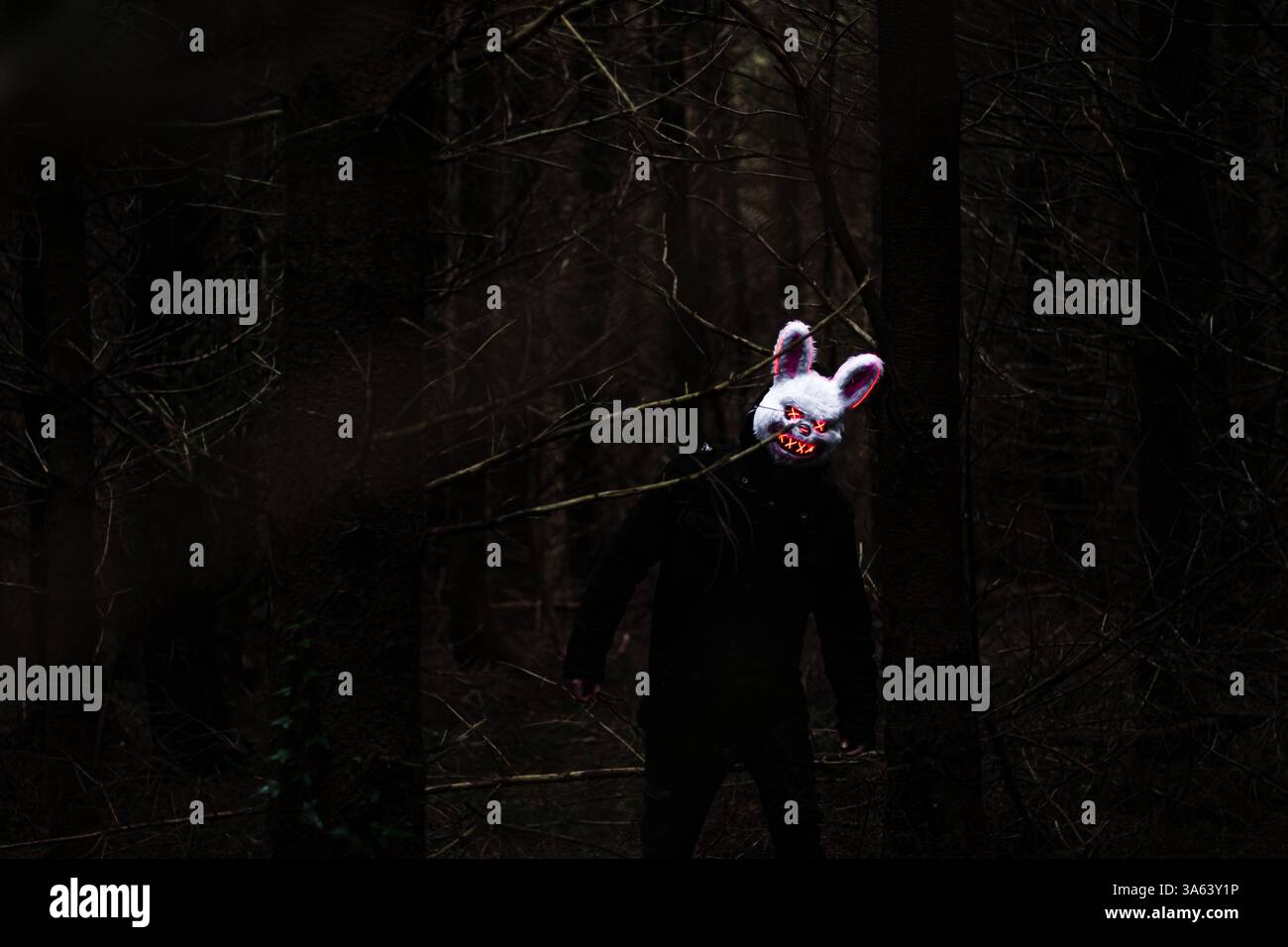Scary Bunny Mask with Neon X Eyes - Halloween Fear in the Forest Stock ...