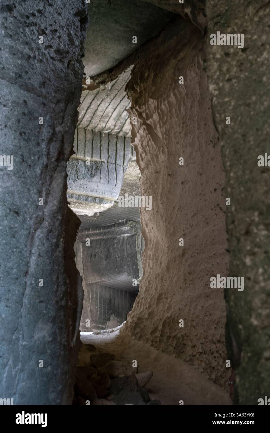 Itinerario Cave, known as Scalo Cavello, is a rock formation showing ...