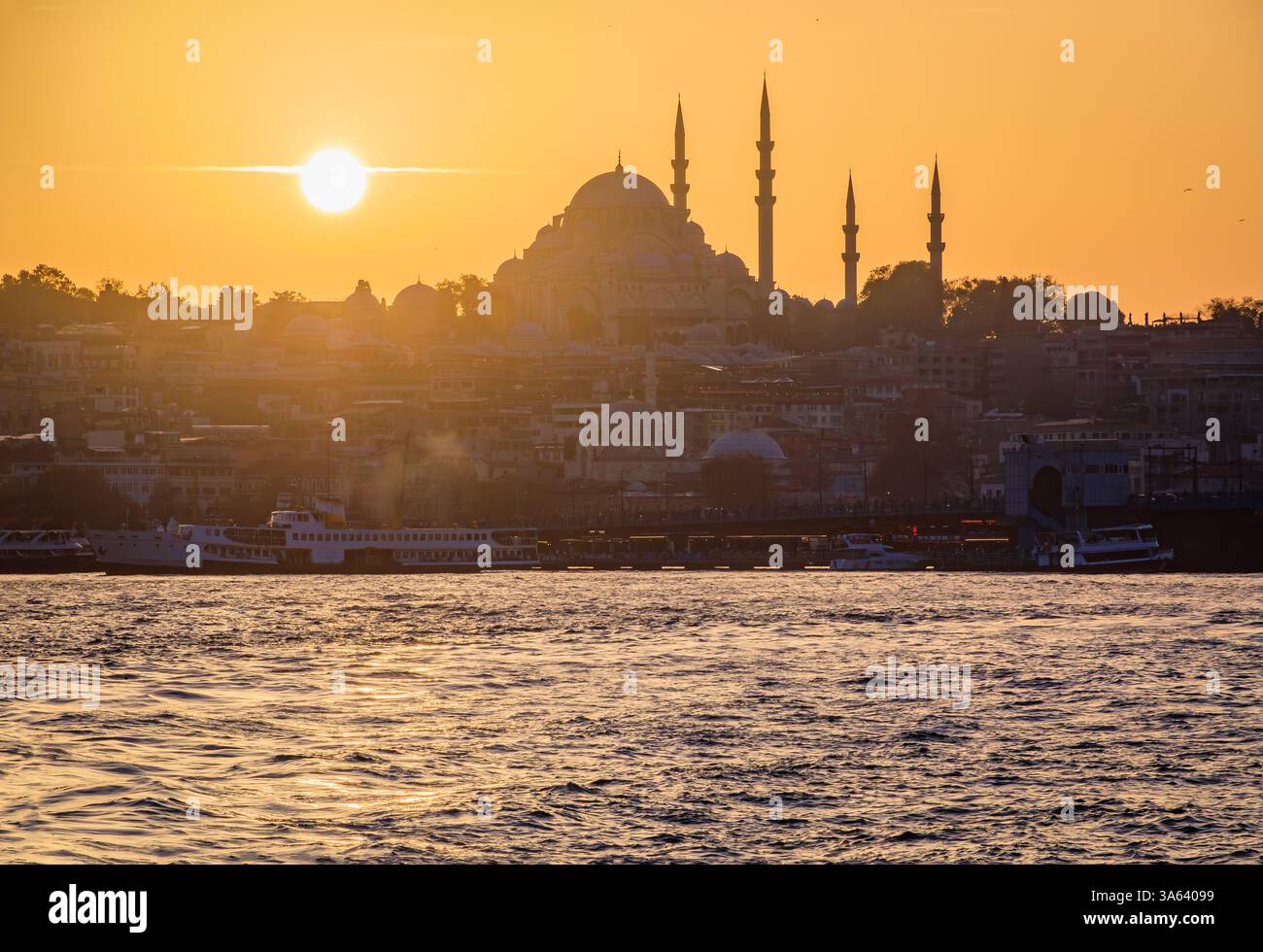 Sunset cityscape of the Historic Peninsula area across Bosphorus Strait ...