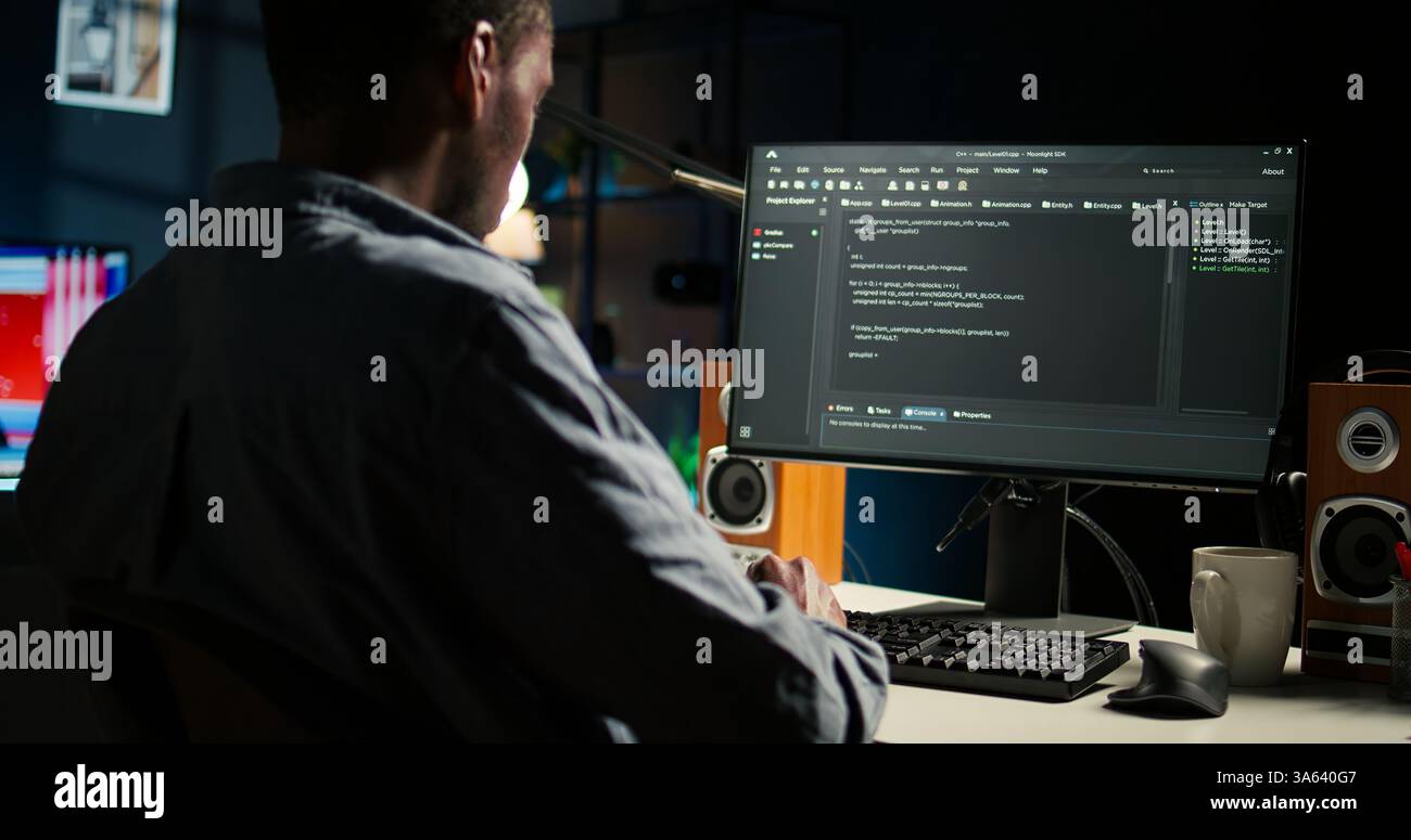 Black man programmer manages code and scripts in artificial intelligence and machine learning on ...