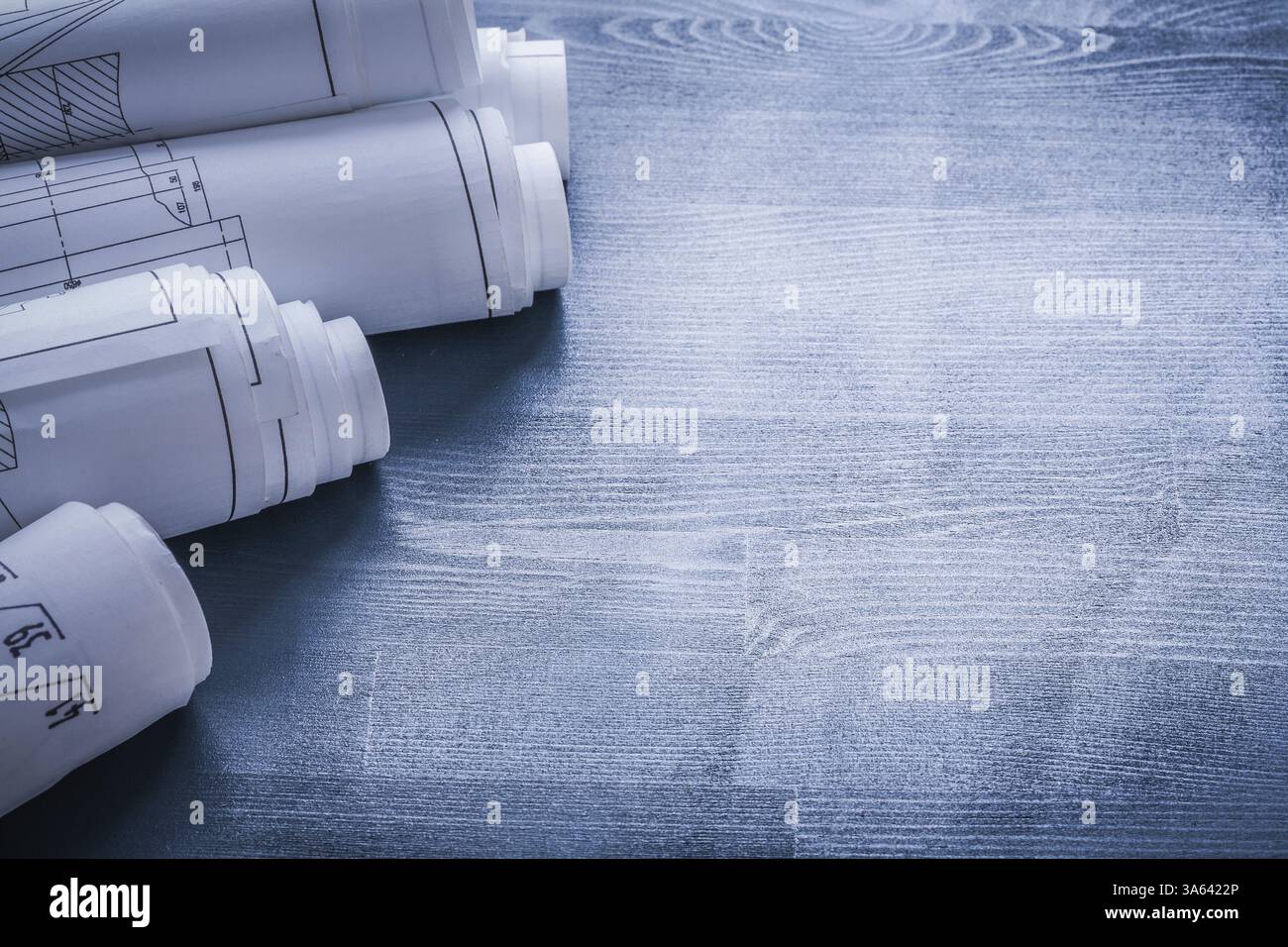 Copyspace image five rolls of blueprints very close up Stock Photo - Alamy
