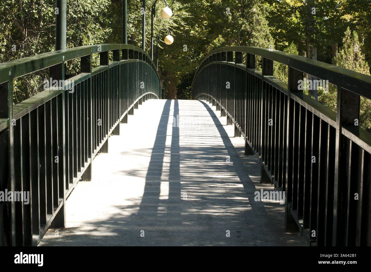Metal bridge over the river Stock Photo - Alamy