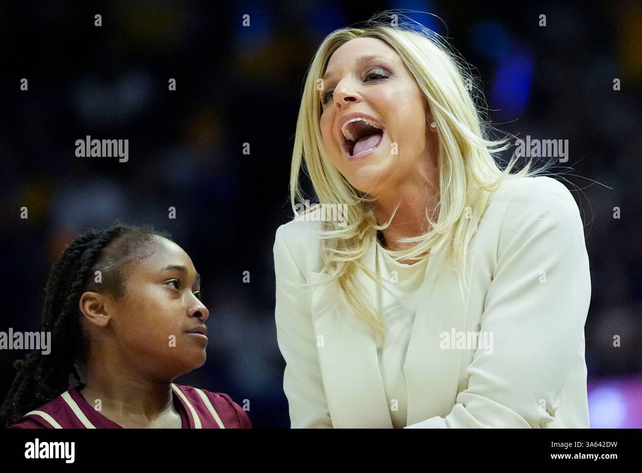 Florida State head coach Brooke Wyckoff calls out to an official during ...