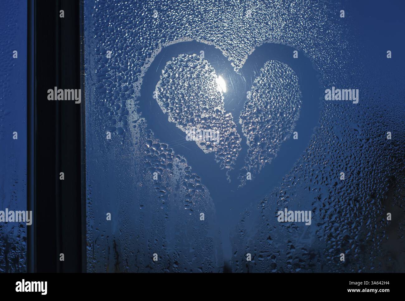 Moonlight through the window. Sweaty glass and heart shape Stock Photo ...