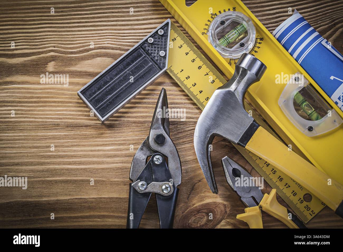 Blue engineering drawings construction level square ruler claw hammer ...