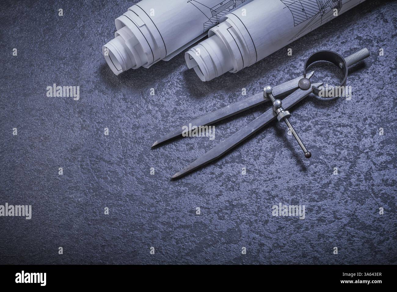 Blueprints pair of compasses on black background construction concept ...