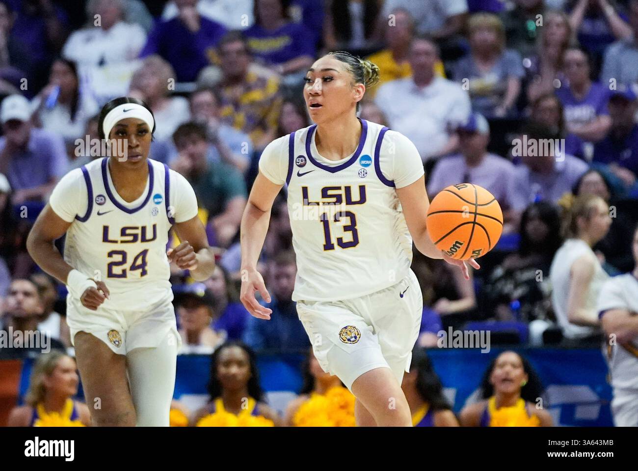 LSU guard Last-Tear Poa (13) moves the ball down court during the first ...