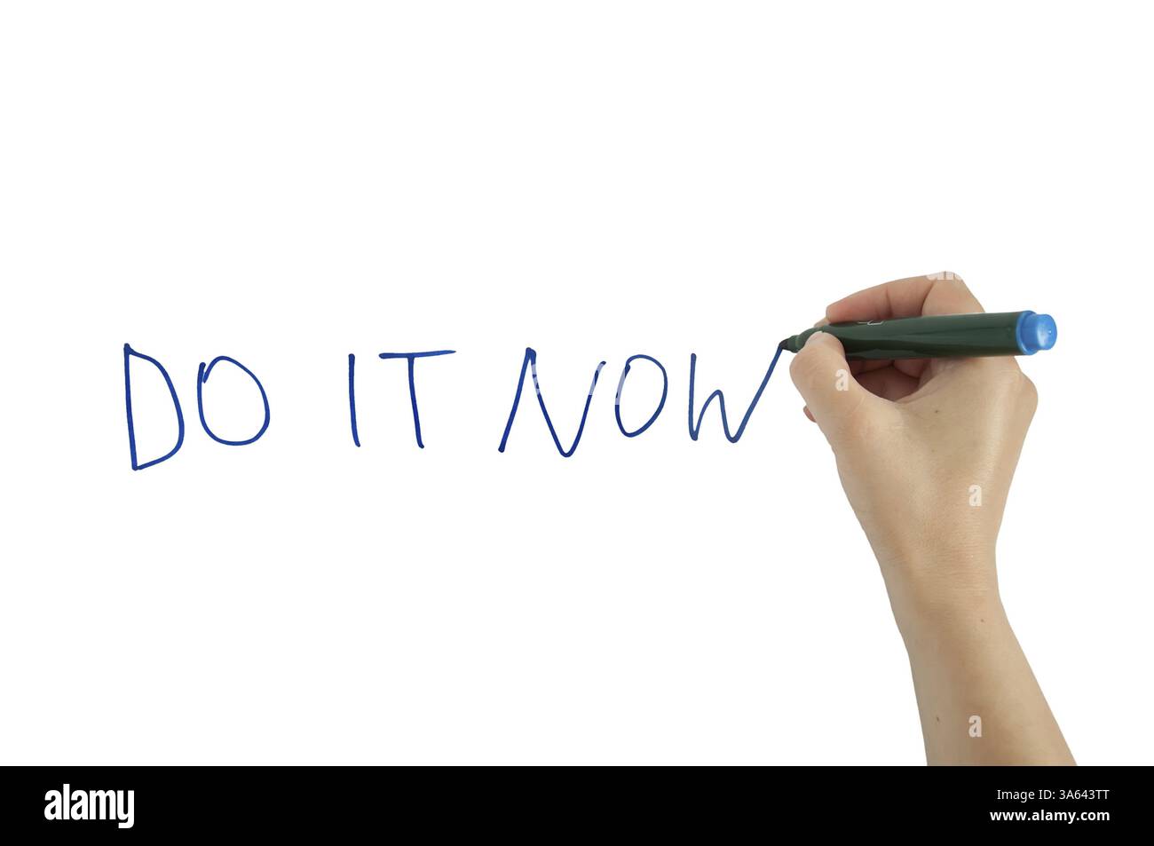 Hand writing Do it now text Stock Photo - Alamy