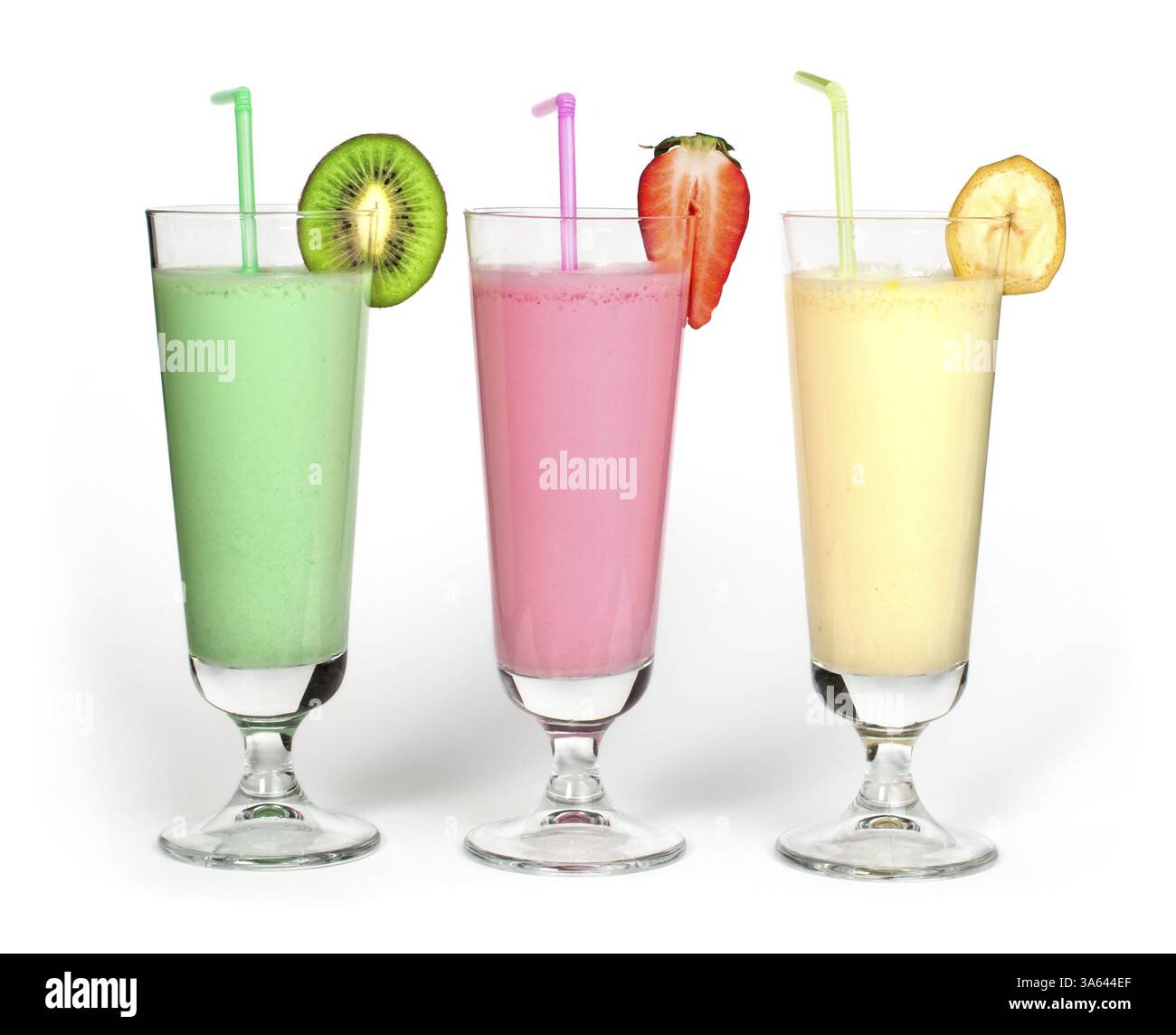 Banana, kiwi and strawberry milk shake and fresh fruis. Cocktail with ...