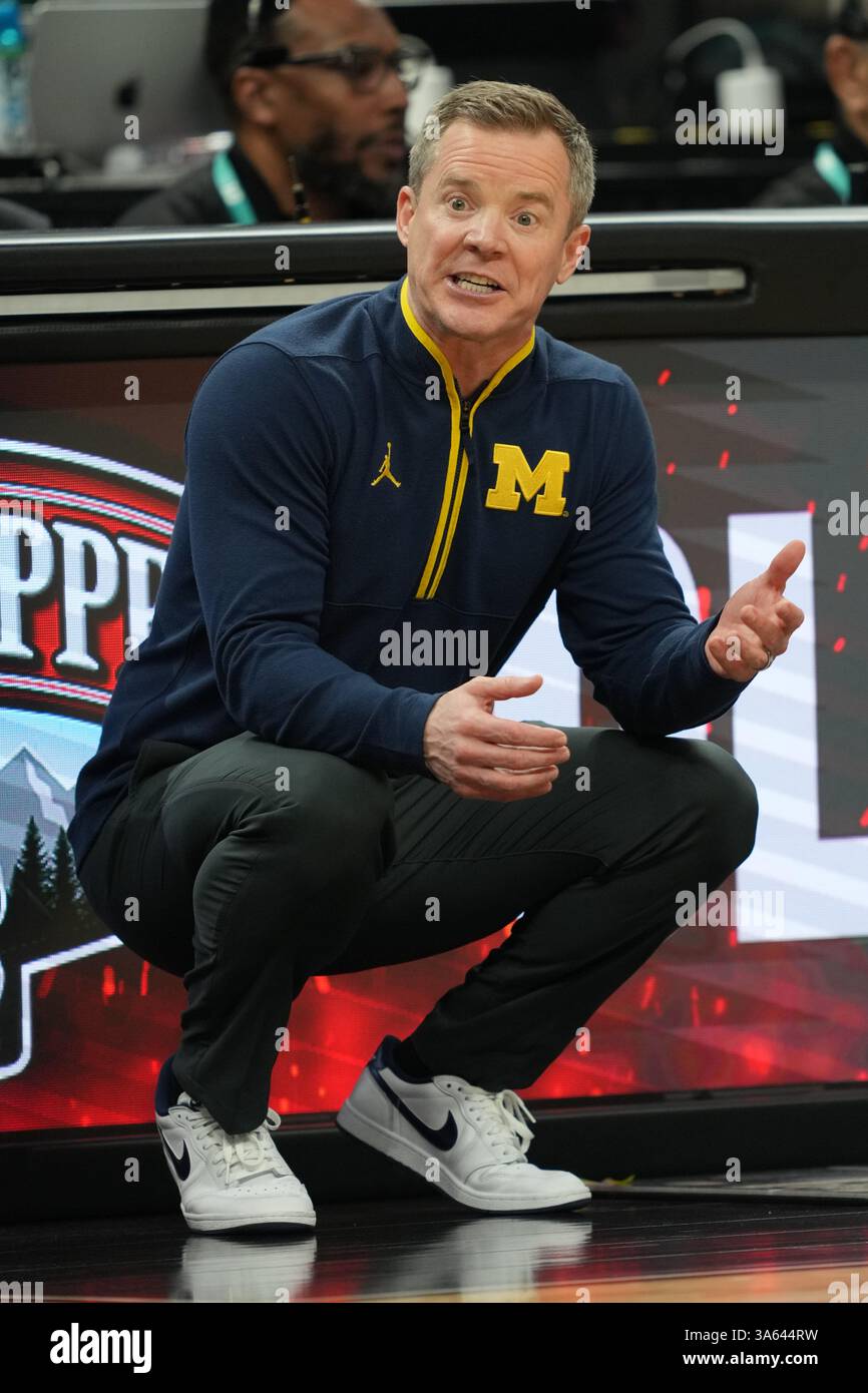Michigan Wolverines head coach Dusty May instructs the team from the ...