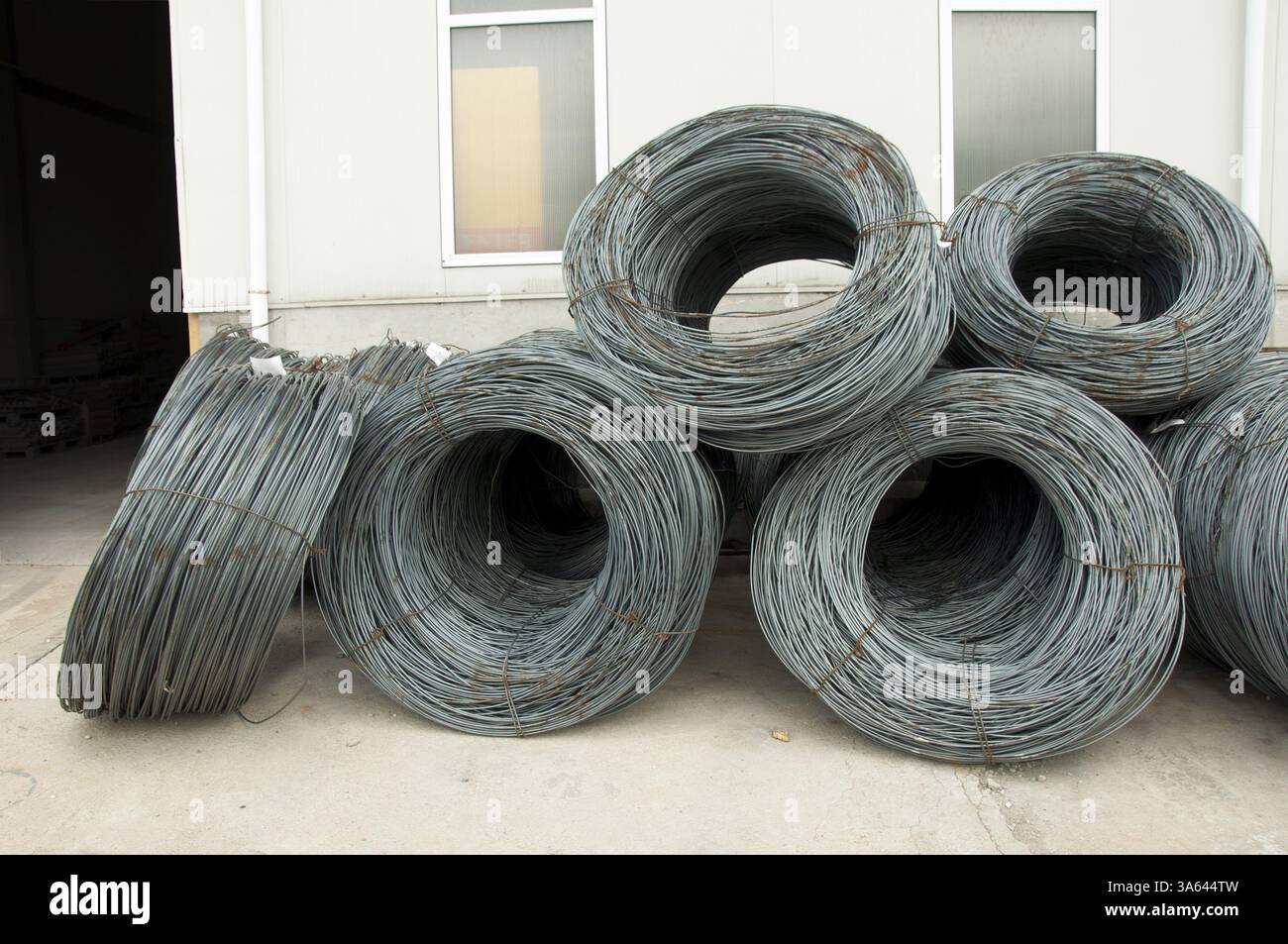 Reinforcing steel bars on roll. Construction materials Stock Photo - Alamy
