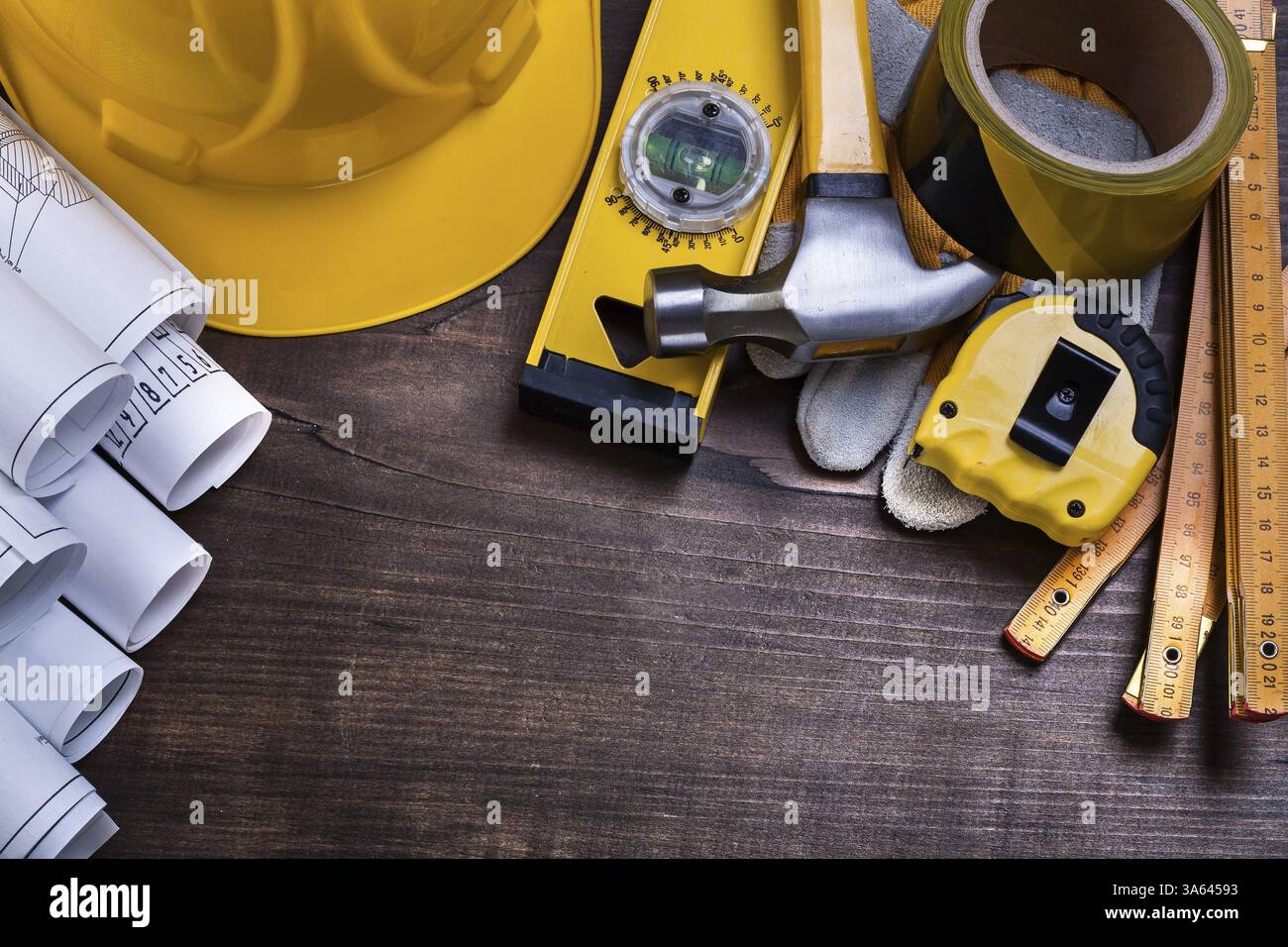 Construction drawings and set of building objects on vintage pine ...