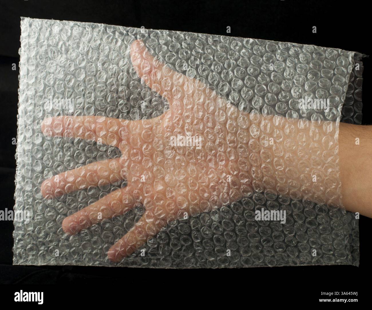Plastic bag and hand inside. Black isolated Stock Photo - Alamy
