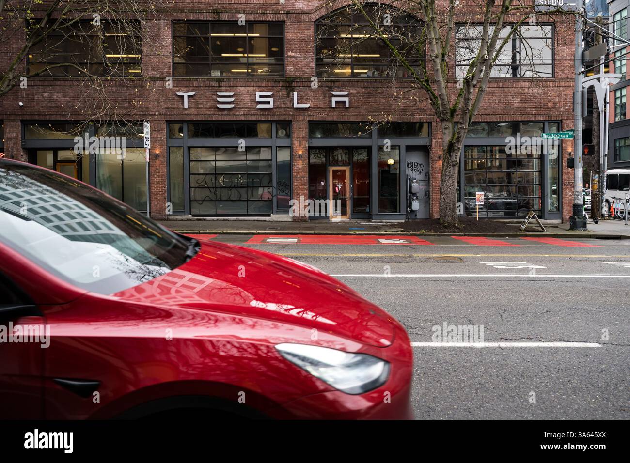 Seattle, USA. 24th Mar 2025. Graffiti damage at the Tesla South Lake ...