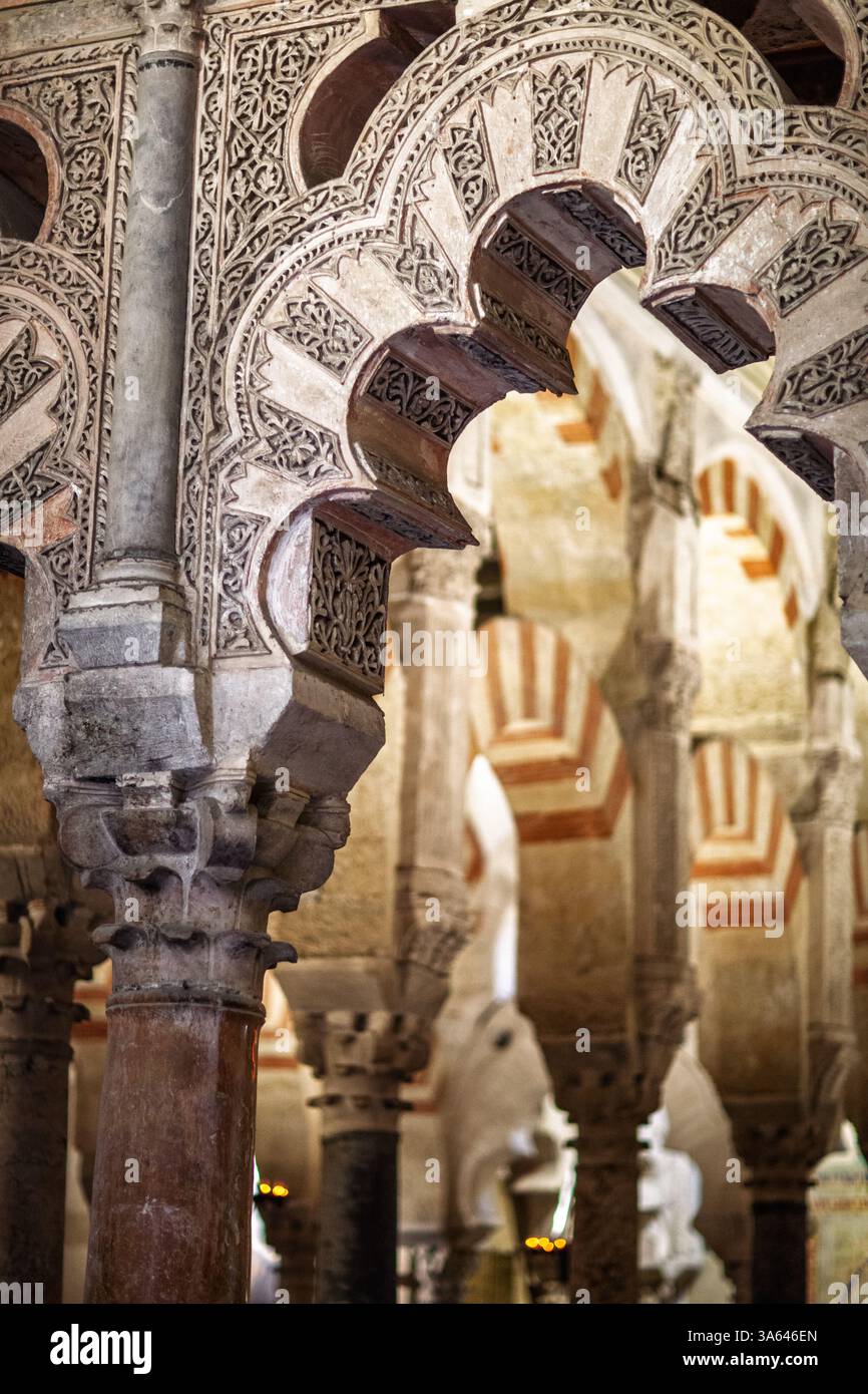 Explore the detailed multifoil arch and columns of the Mosque of ...