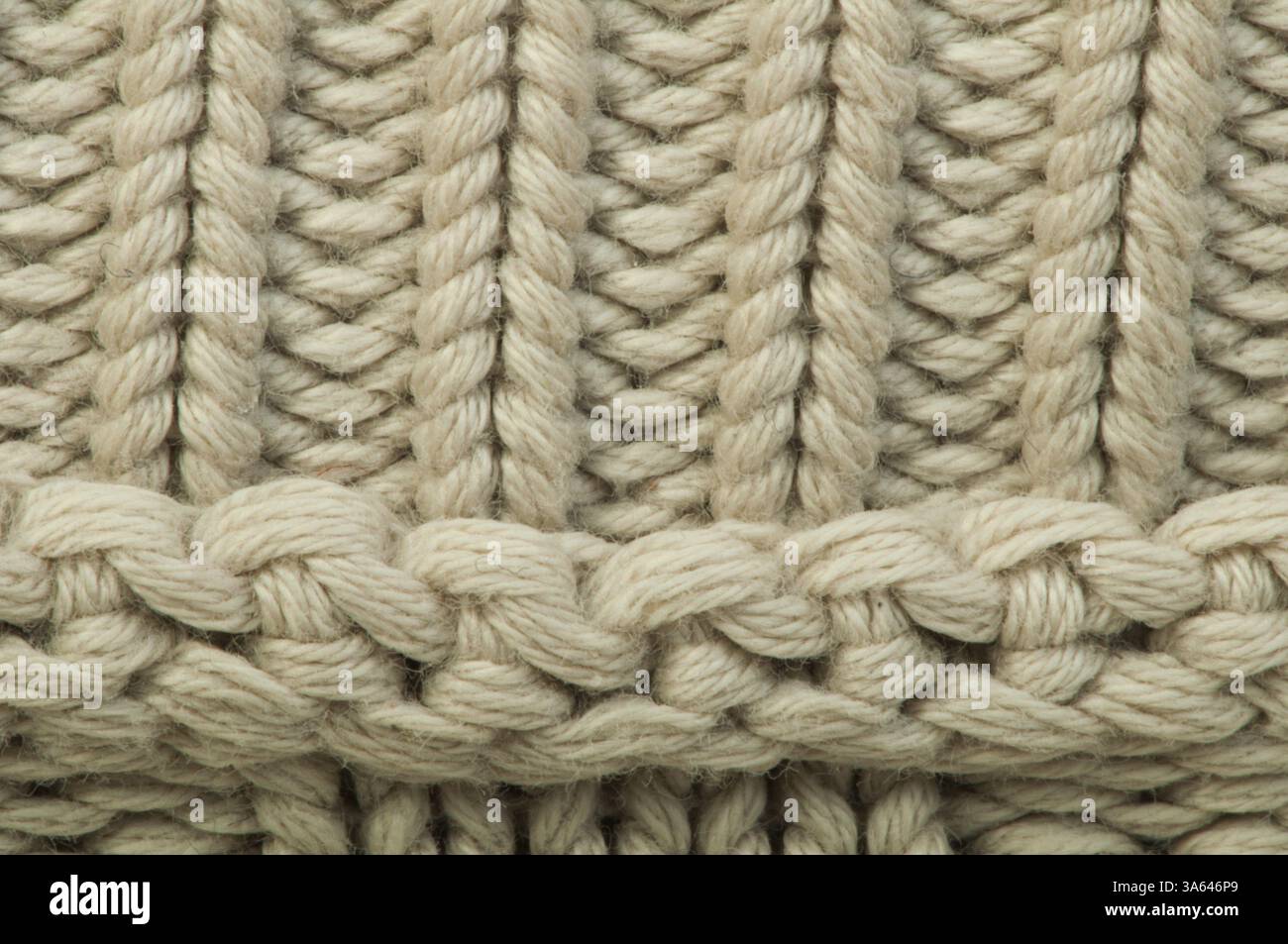 Old knit sweater background. Beige color. Studio shot Stock Photo - Alamy
