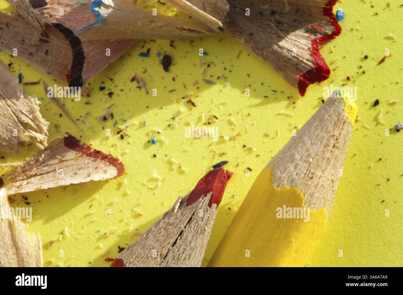 Color pencils and pencil peels over note paper Stock Photo - Alamy