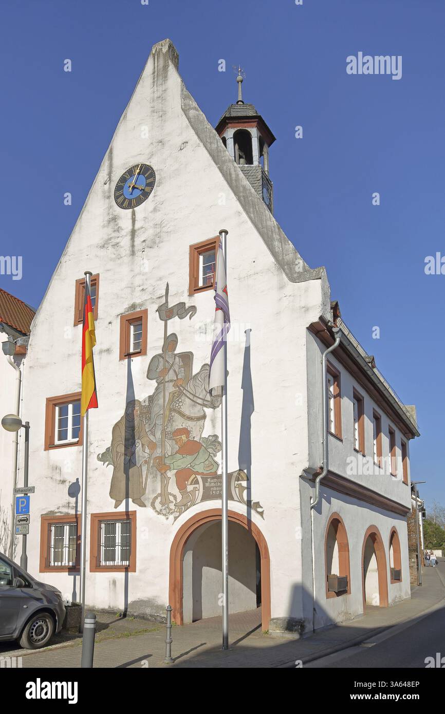 Old town hall built in 1504 with wall painting, medieval knight riding ...