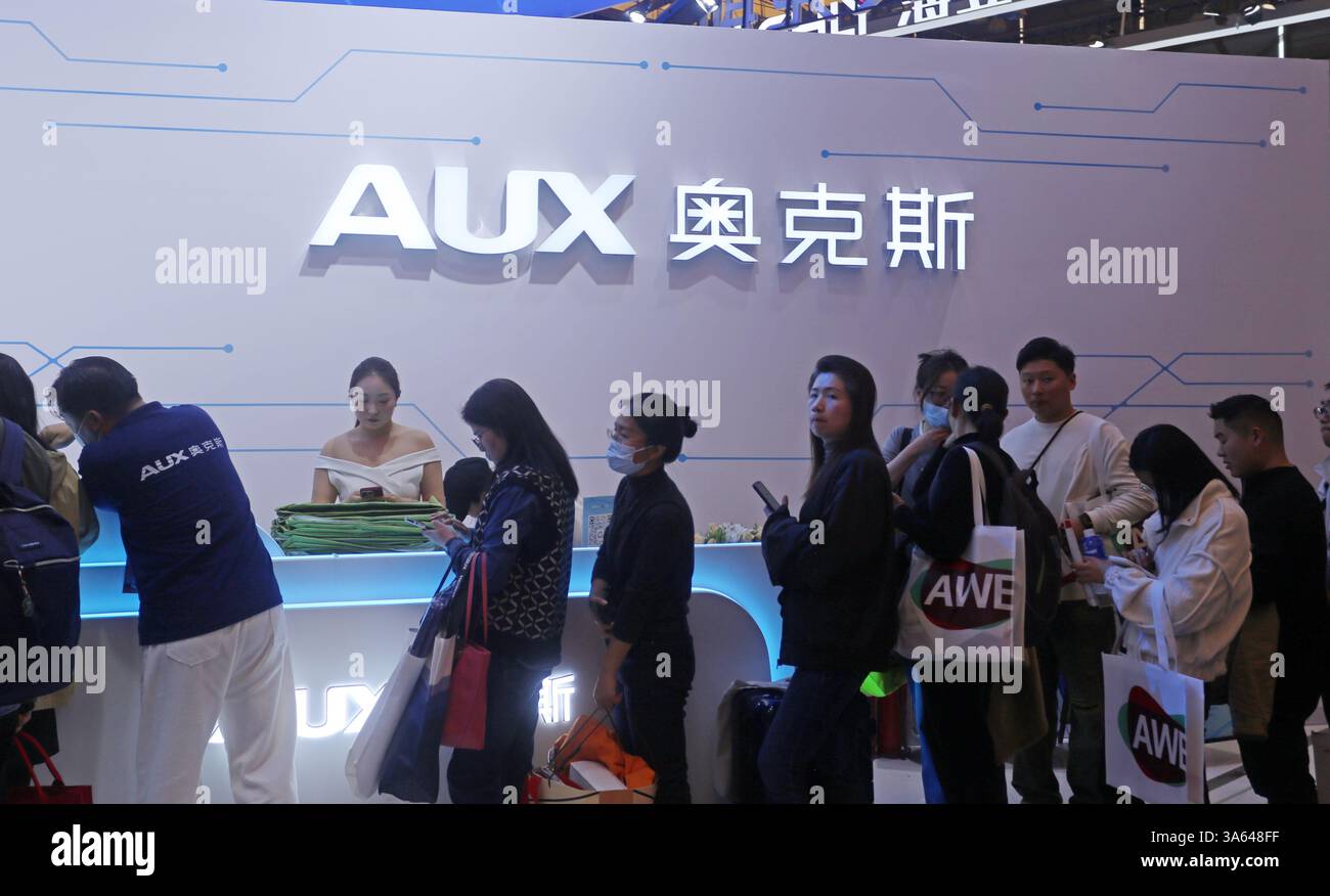 SHANGHAI, CHINA - MARCH 20, 2025 - Visitors visit the AUX booth at 2025AWE in Shanghai, China on ...