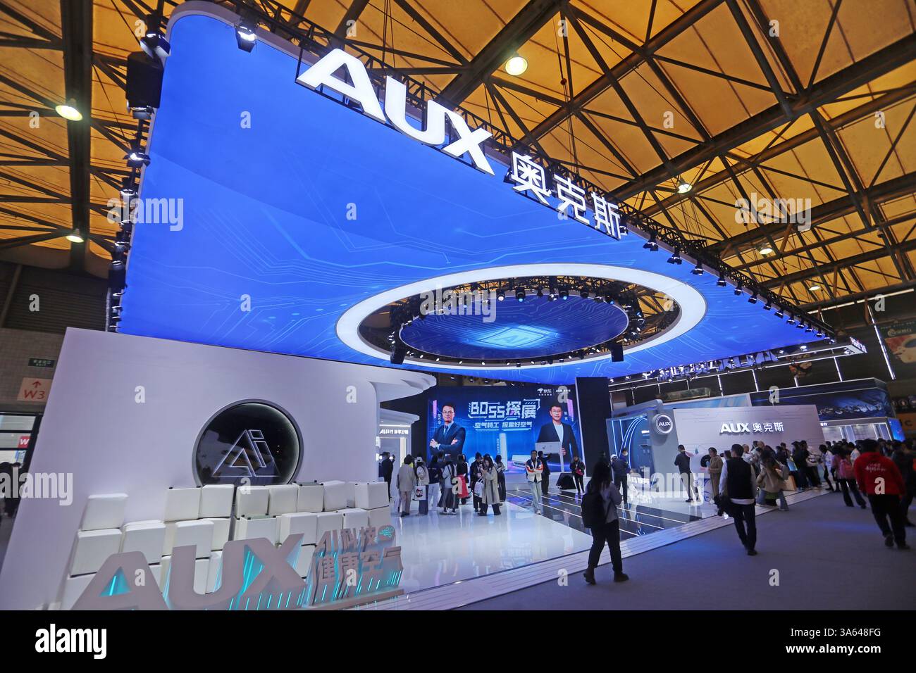 SHANGHAI, CHINA - MARCH 20, 2025 - Visitors visit the AUX booth at ...