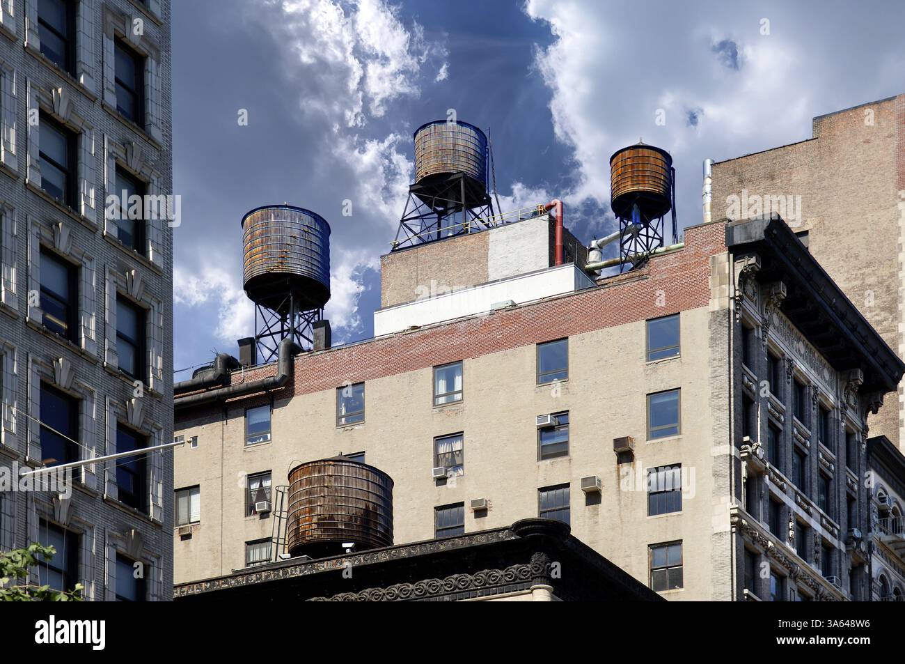 Wooden water storage tanks on the roof of a high-rise building, New ...